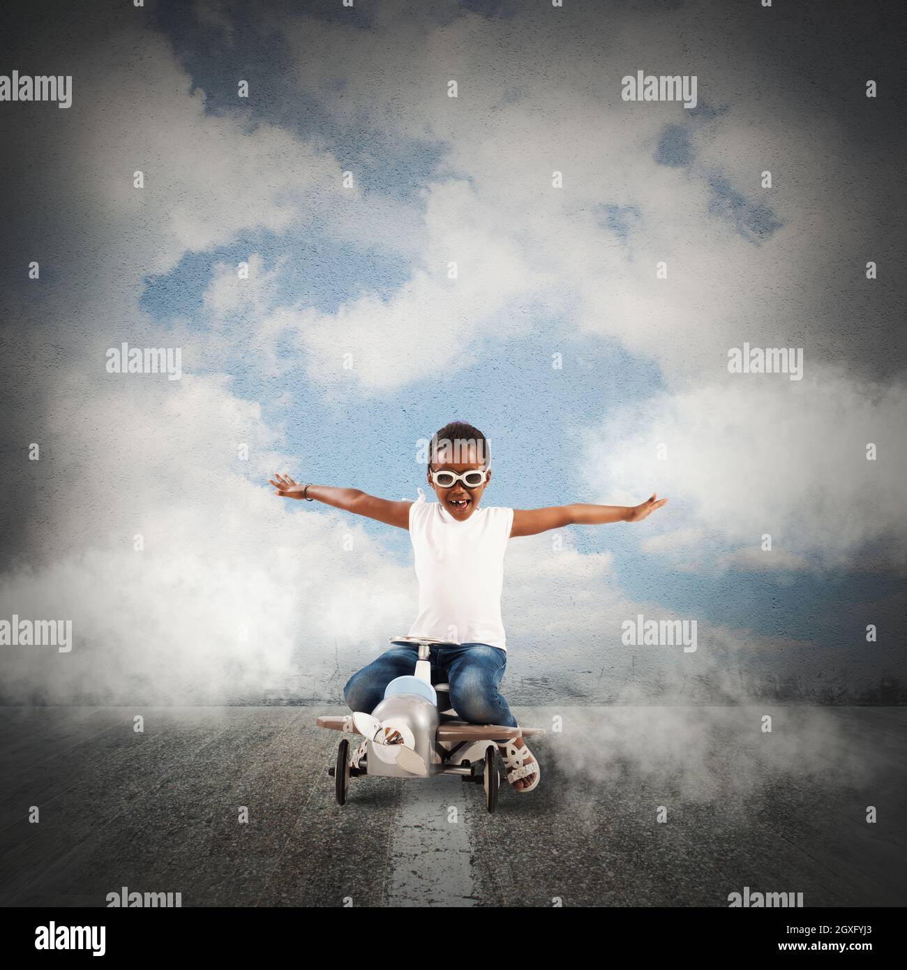 Little girl on an airplane with wheels Stock Photo - Alamy