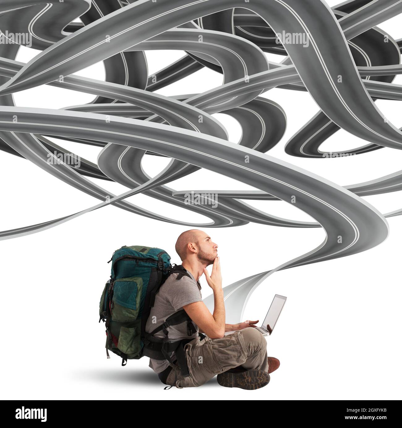 Man explorer with laptop with intertwined roads Stock Photo - Alamy