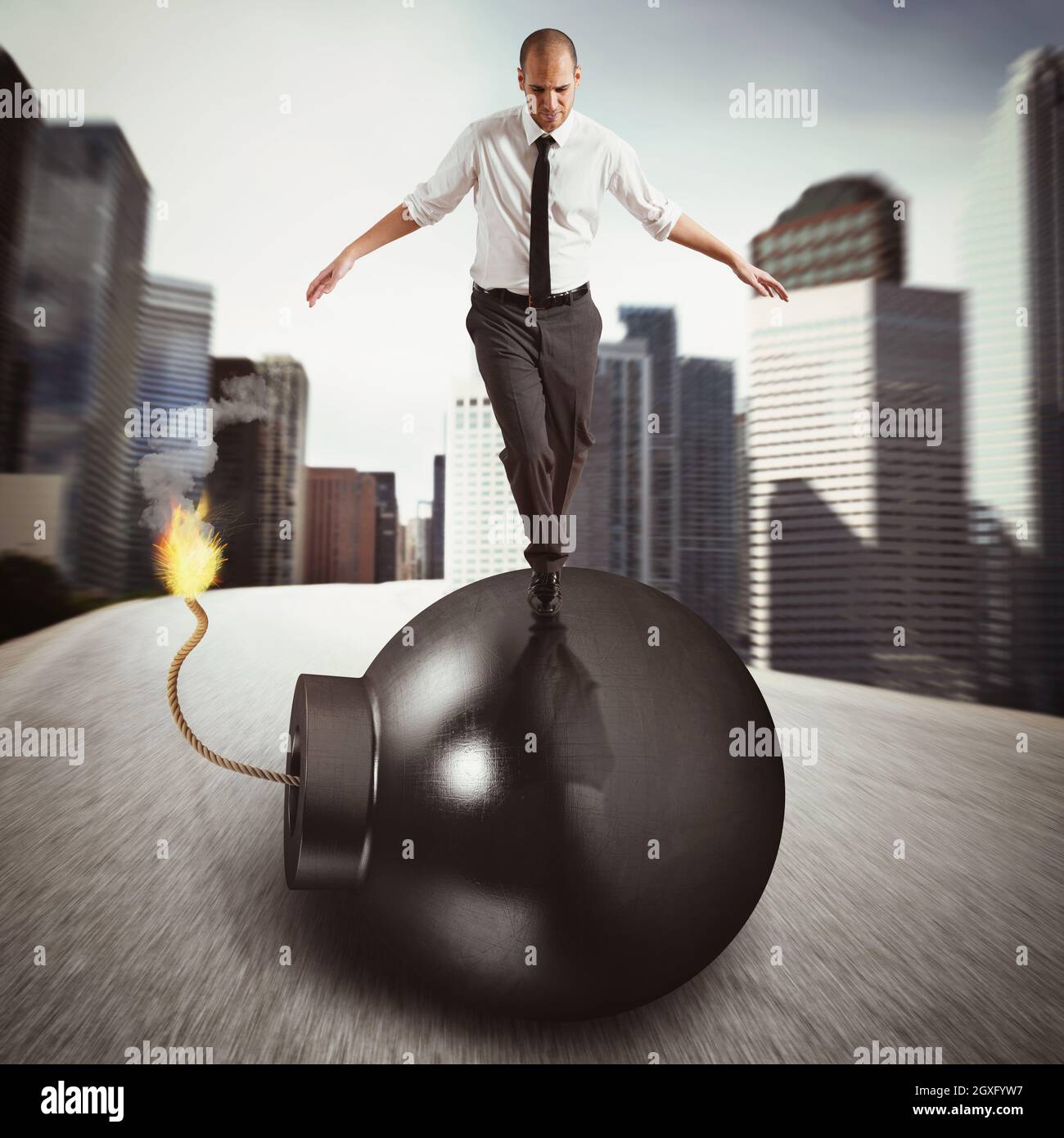 Man walks over bomb with lit fuse Stock Photo - Alamy