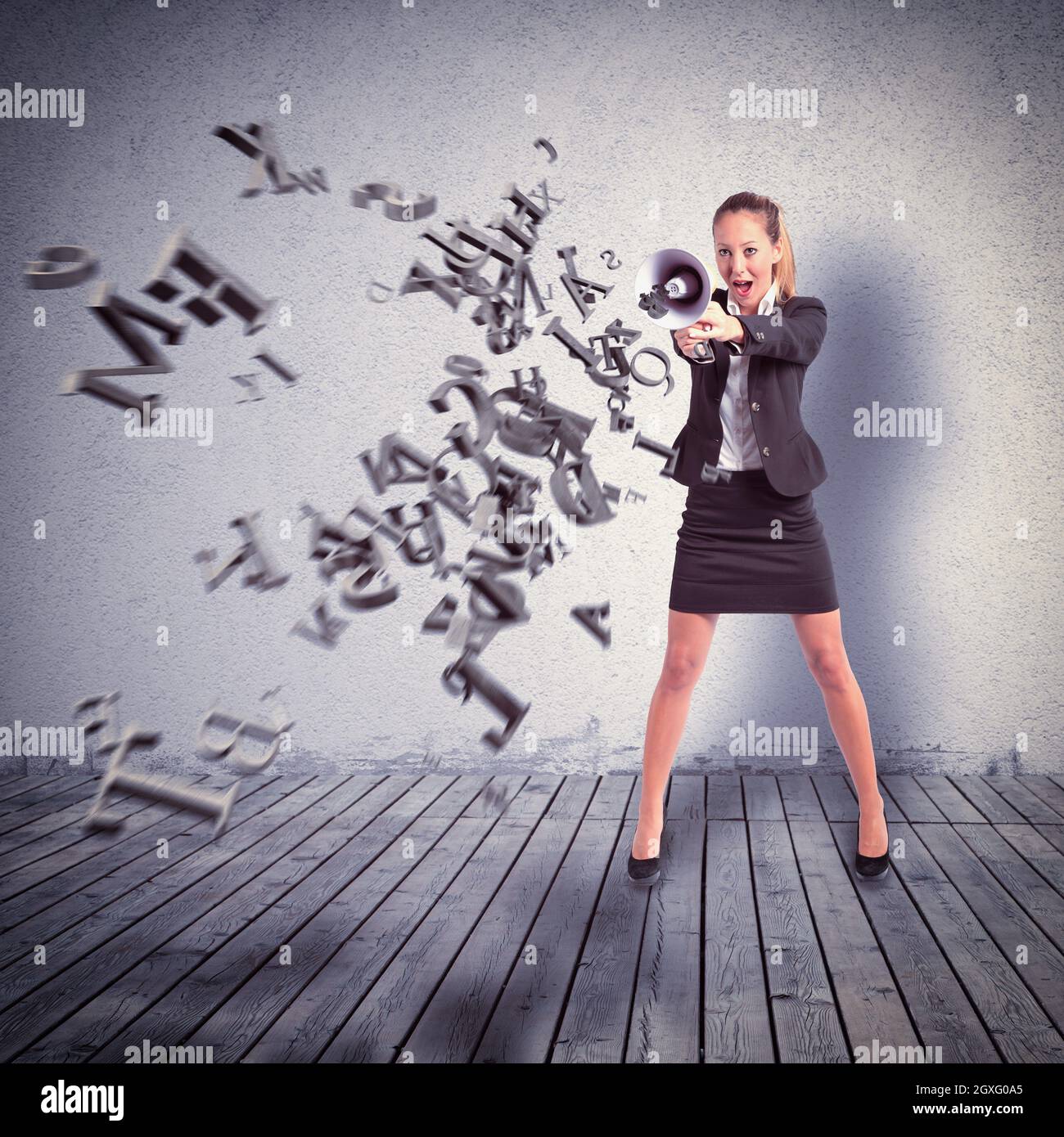 Angry woman screaming on the megaphone letters Stock Photo - Alamy