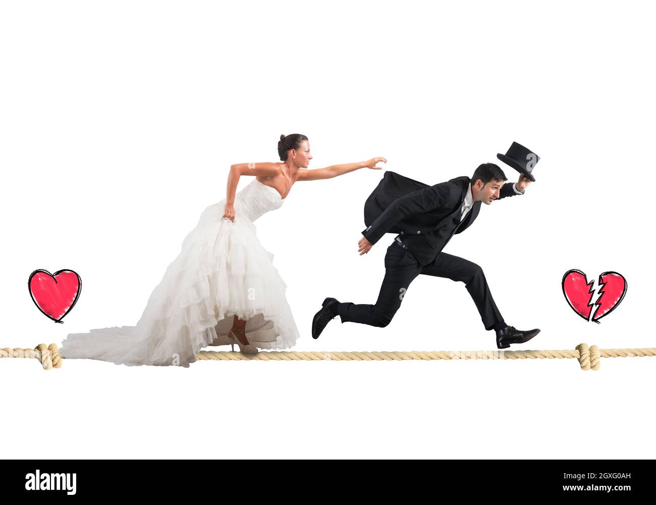 Husband escapes from wife on a rope Stock Photo - Alamy