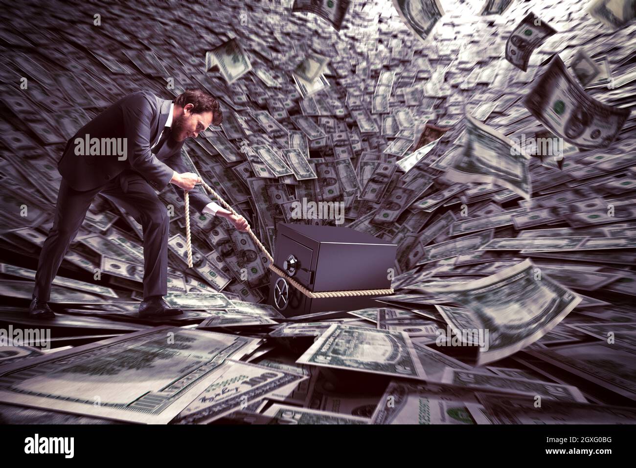 Man pulls a rope attached to safe Stock Photo - Alamy