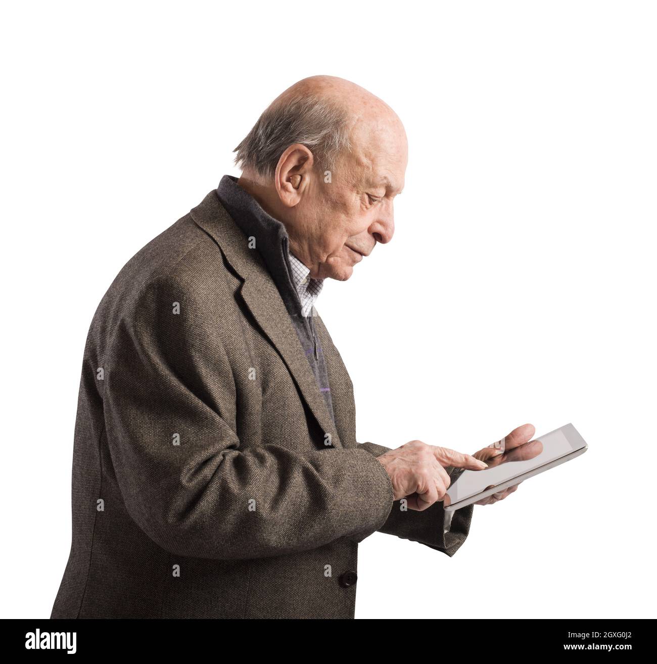 Old man surfing the internet with tablet Stock Photo - Alamy