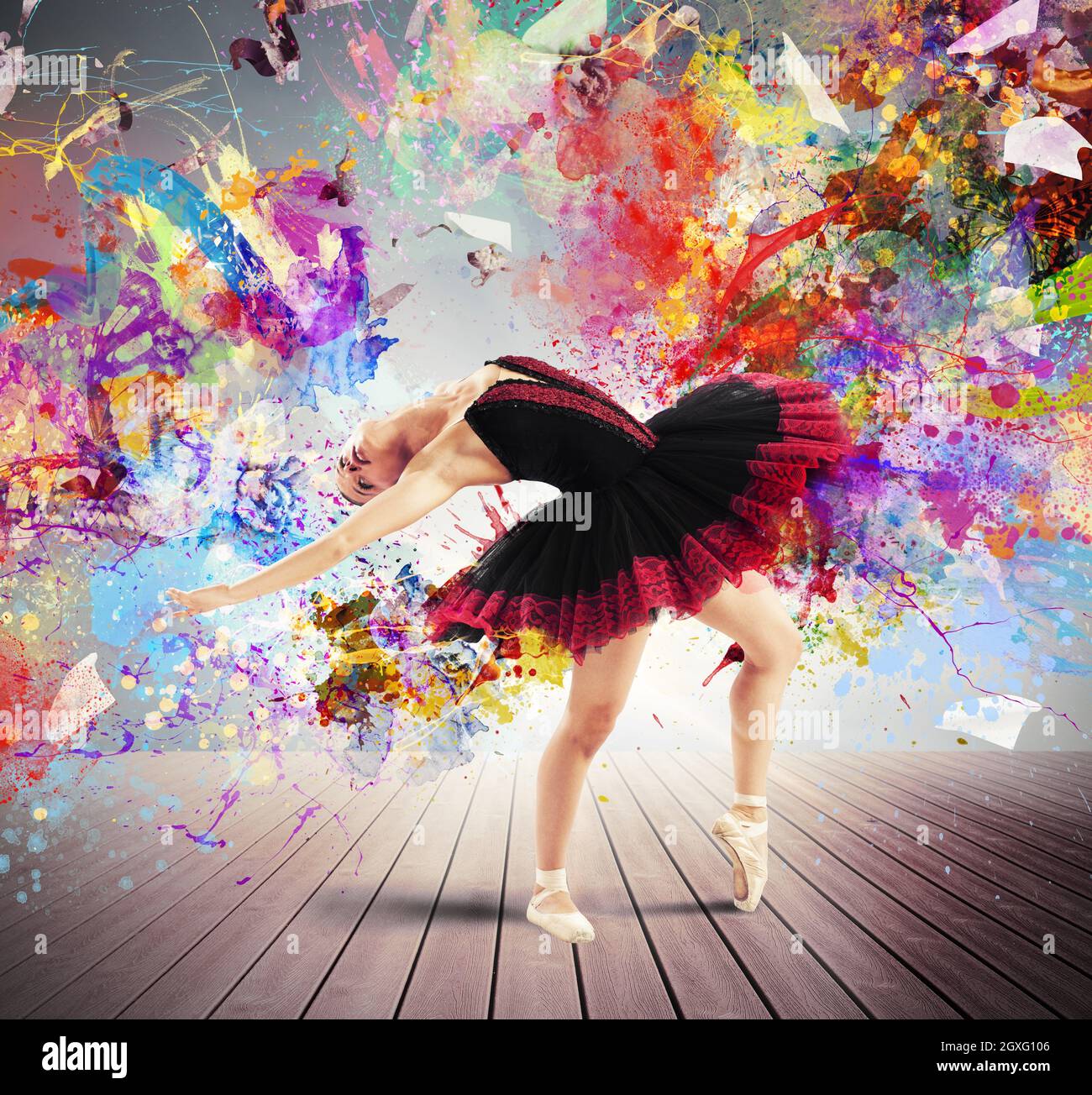 Classical dancer posing between splashes of color Stock Photo - Alamy