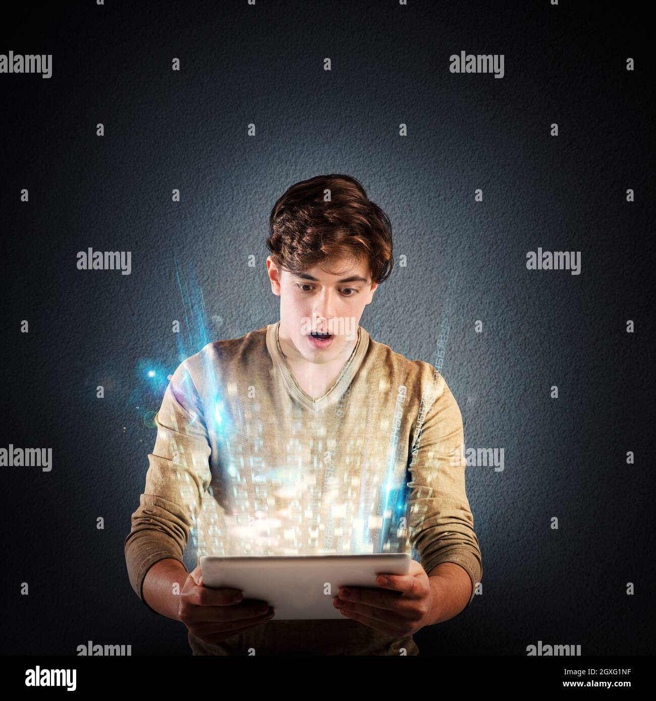 Tablet shocked boy hi-res stock photography and images - Alamy