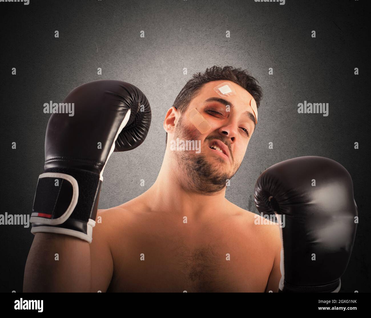 Boxer with bruises and bandages on face Stock Photo - Alamy