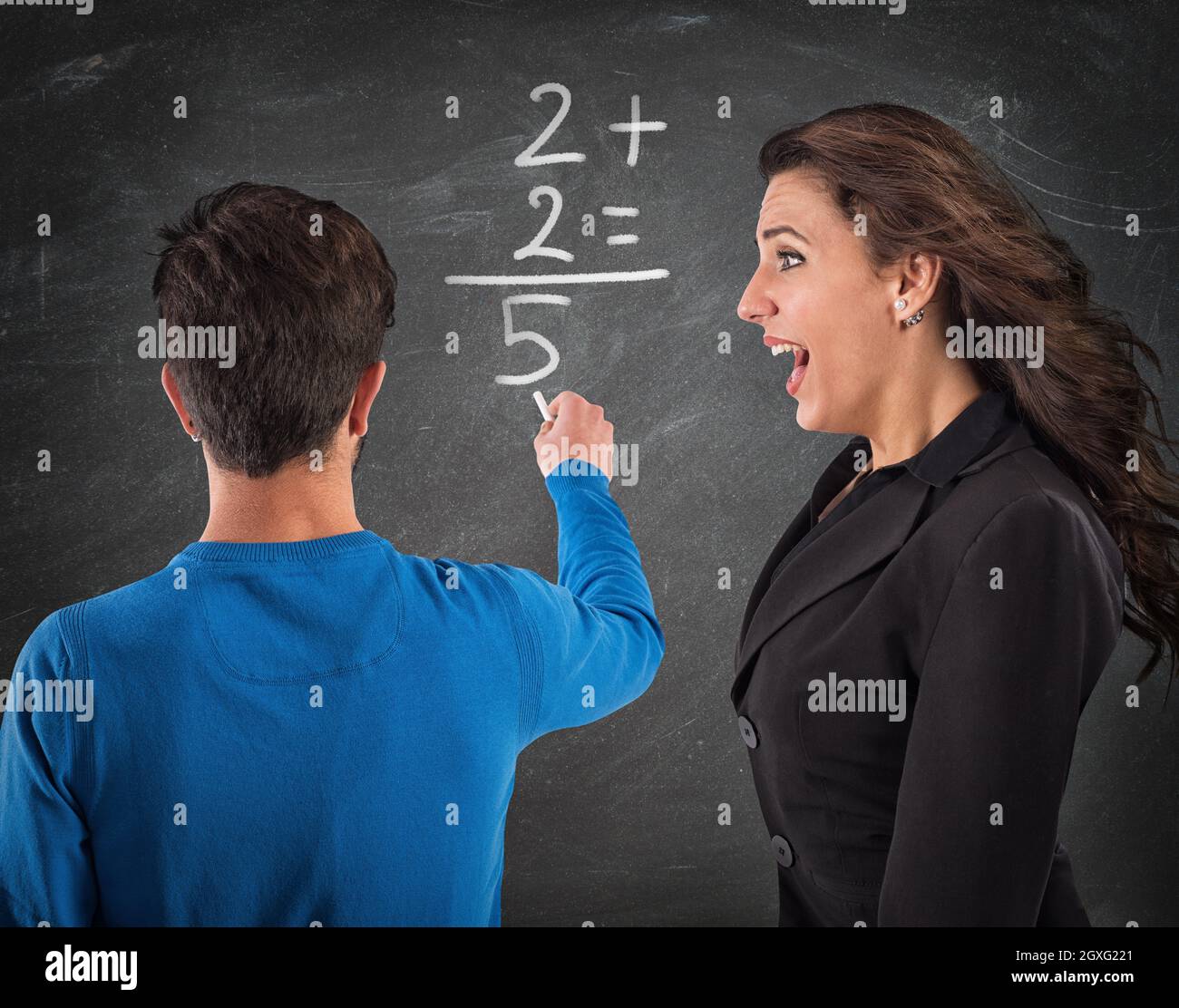 Student writes math operation and teachers screams Stock Photo - Alamy