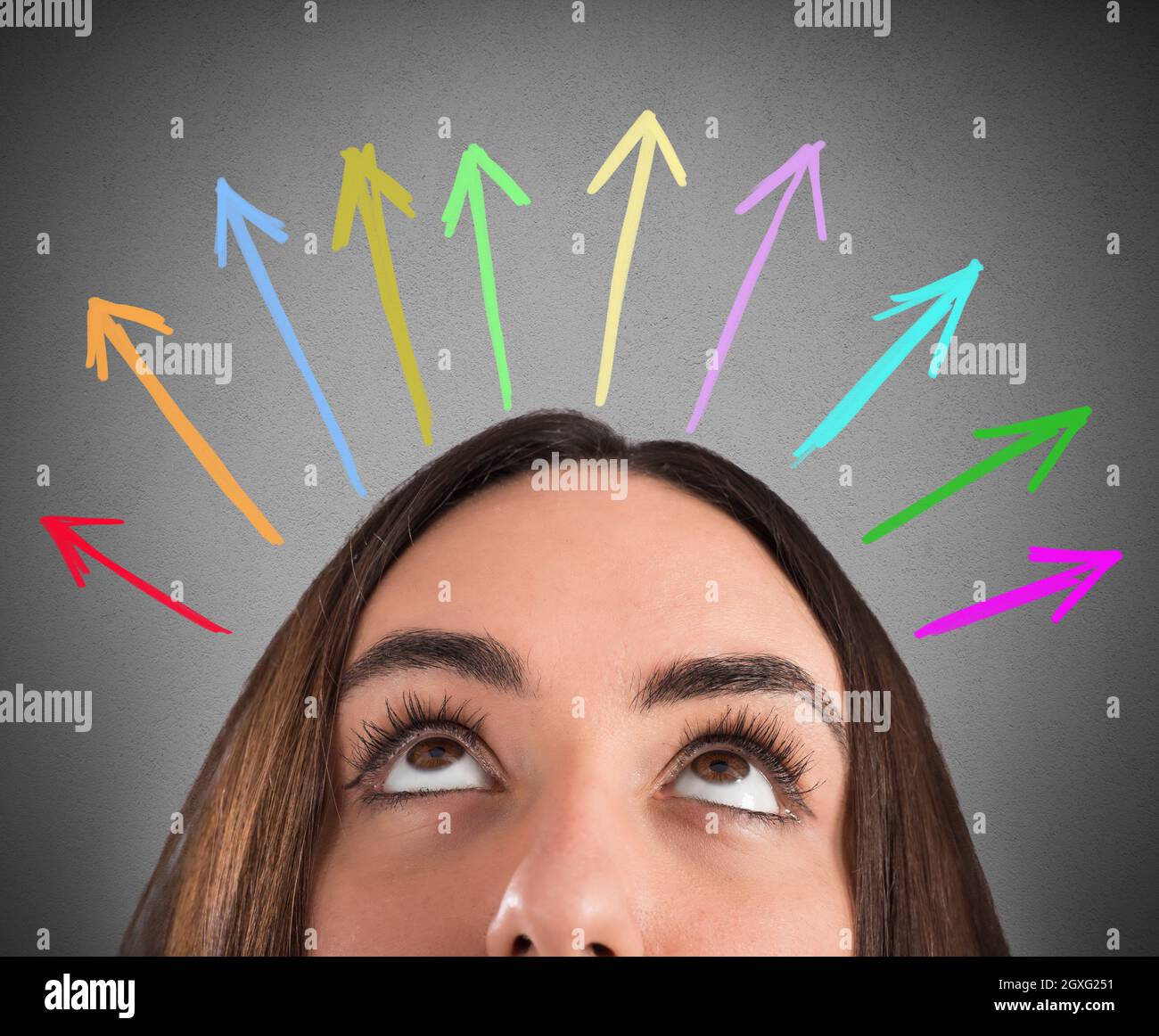 Woman with eyes up and arrow over her head Stock Photo - Alamy