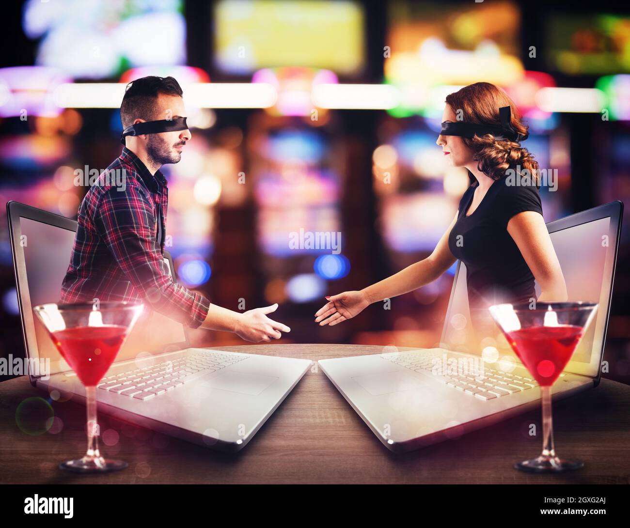 Boy and girl blindfolded come out from the computer screen Stock Photo ...