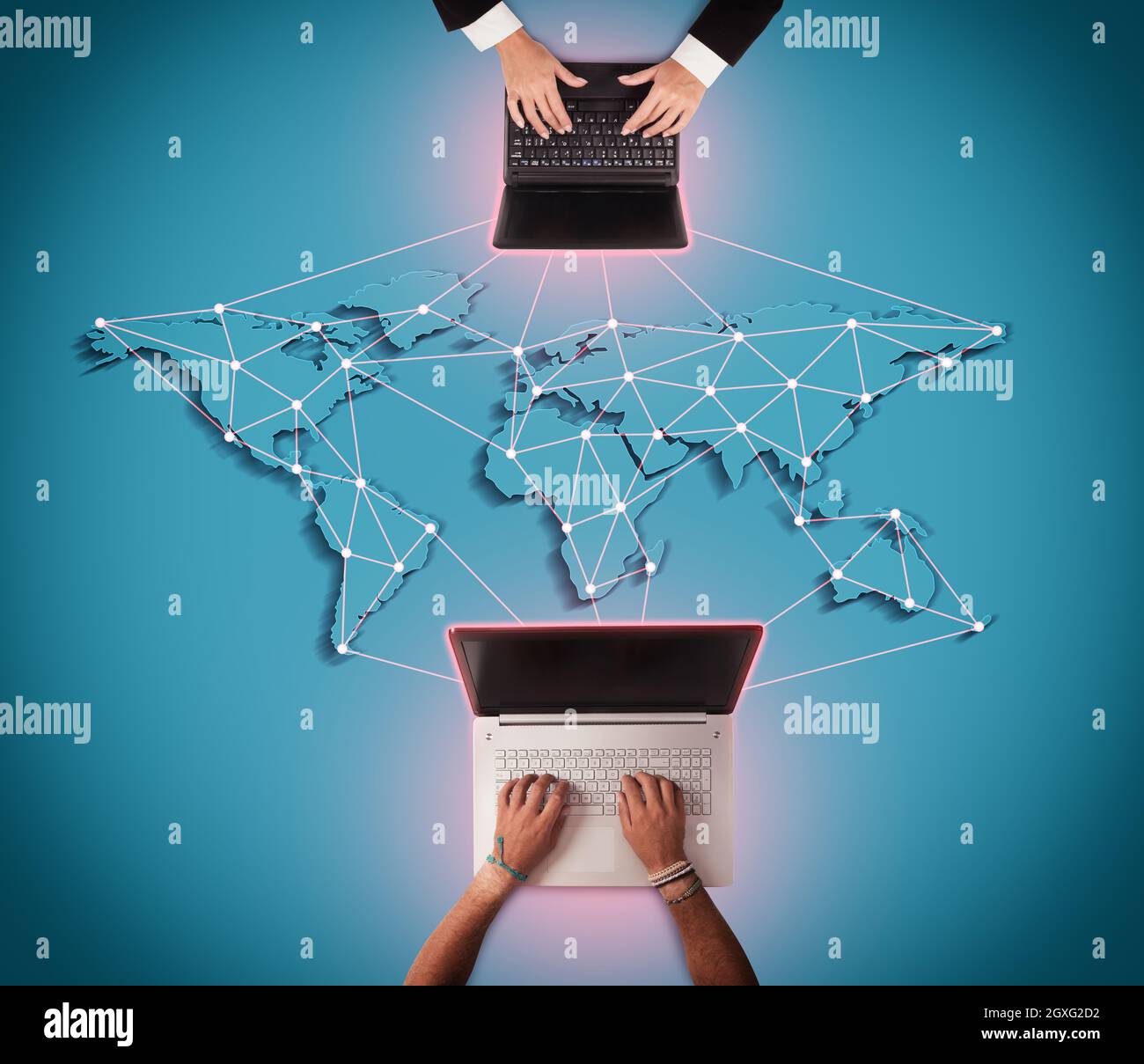 Men writes at computer with world map Stock Photo - Alamy