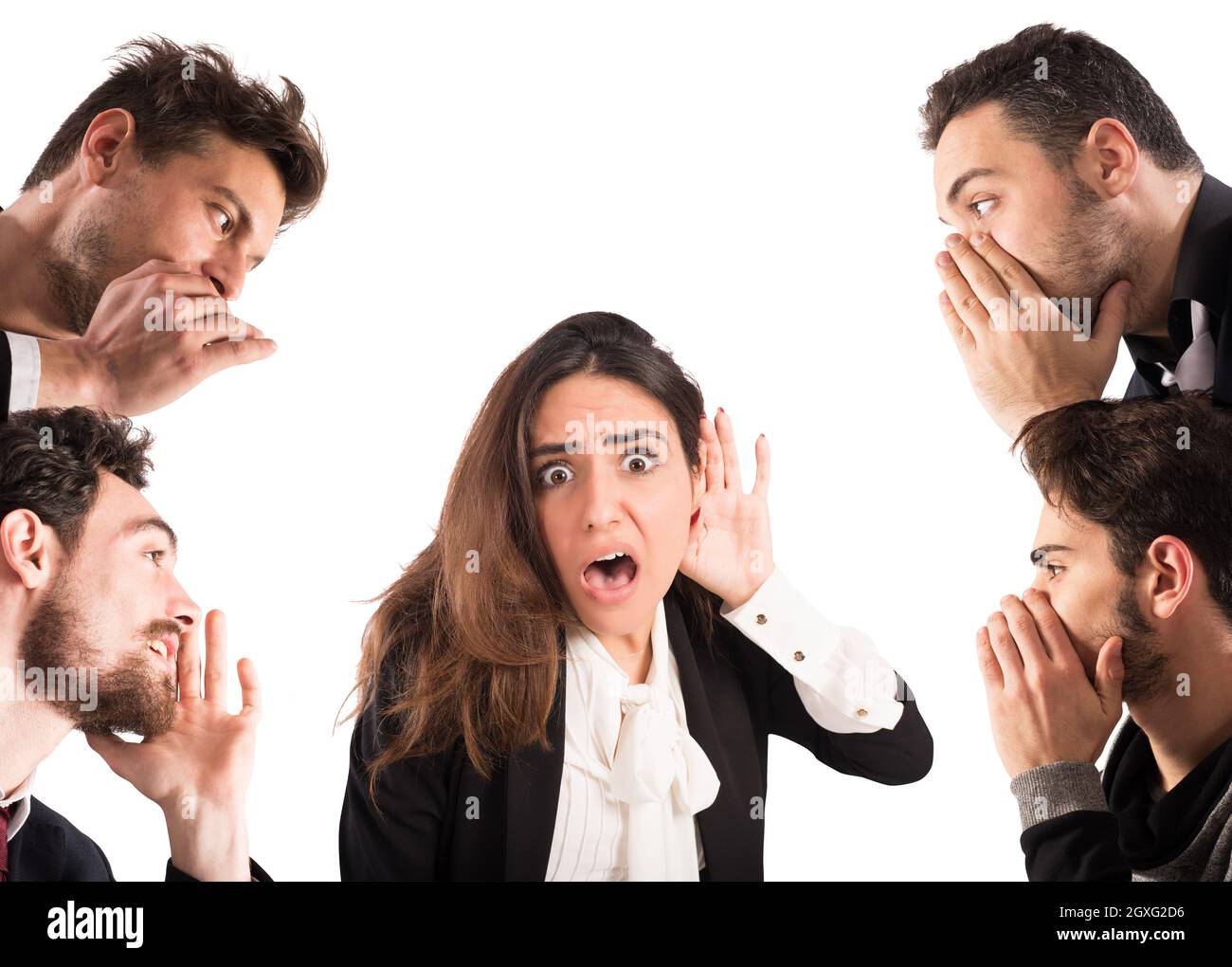 Girl with shocked expression listening to many people Stock Photo - Alamy