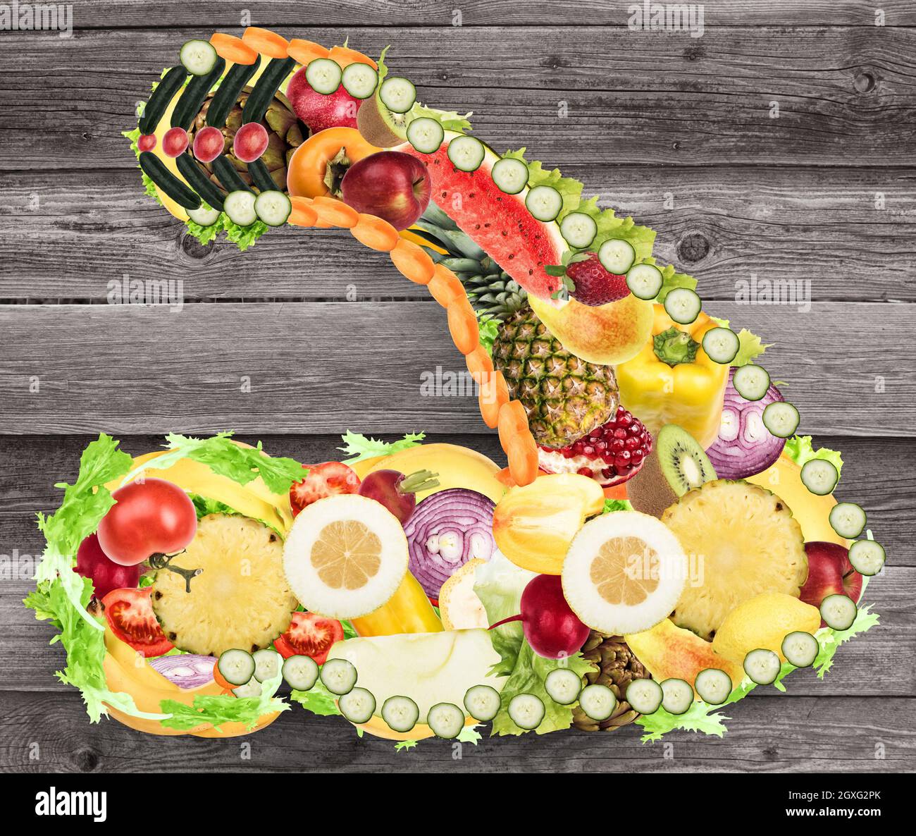 Arm muscles formed from fruits and vegetables Stock Photo - Alamy