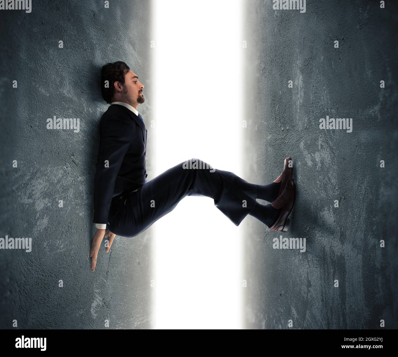 Businessman man trapped between two walls strives to push Stock Photo ...