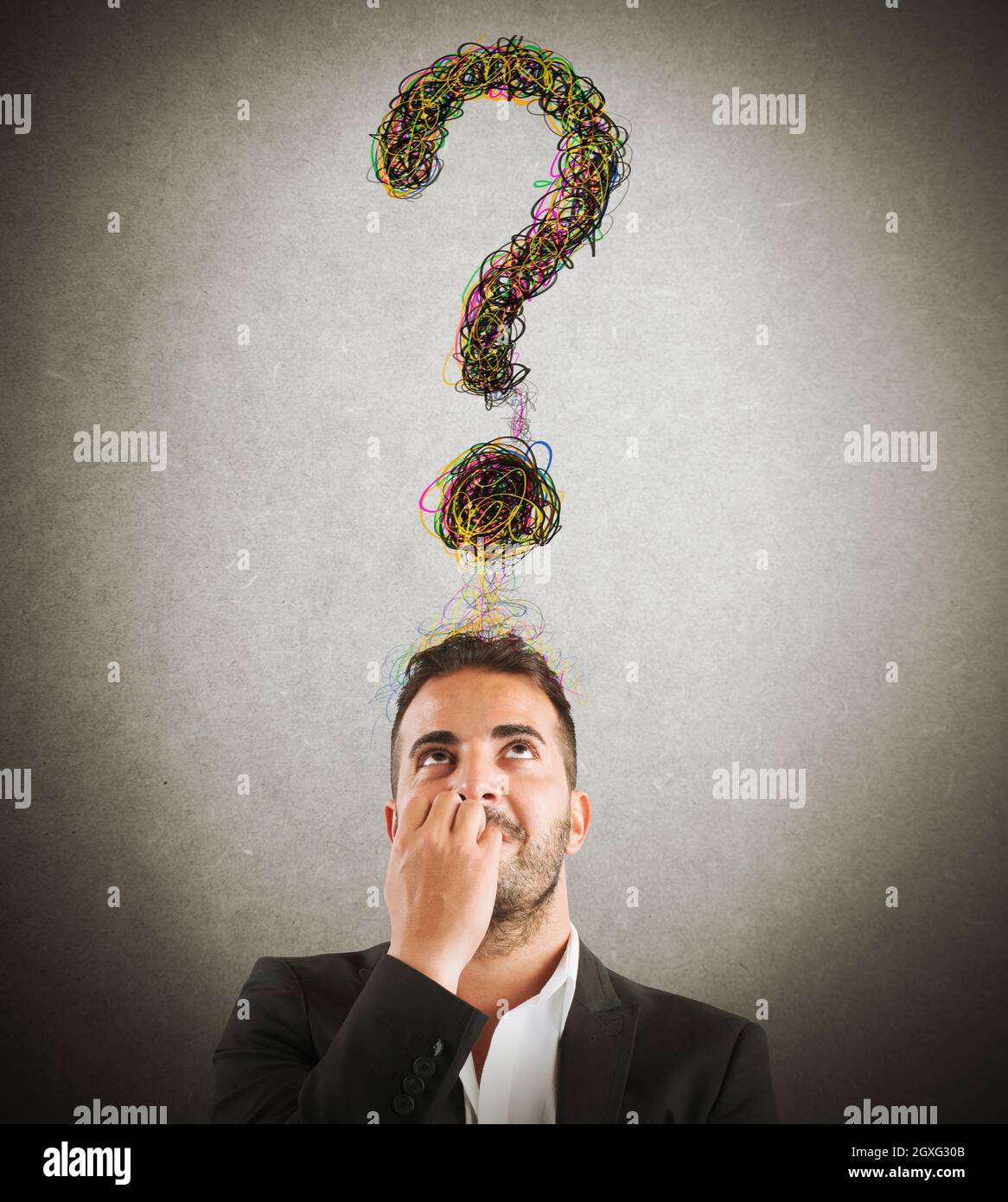 Businessman with big question mark over head Stock Photo - Alamy