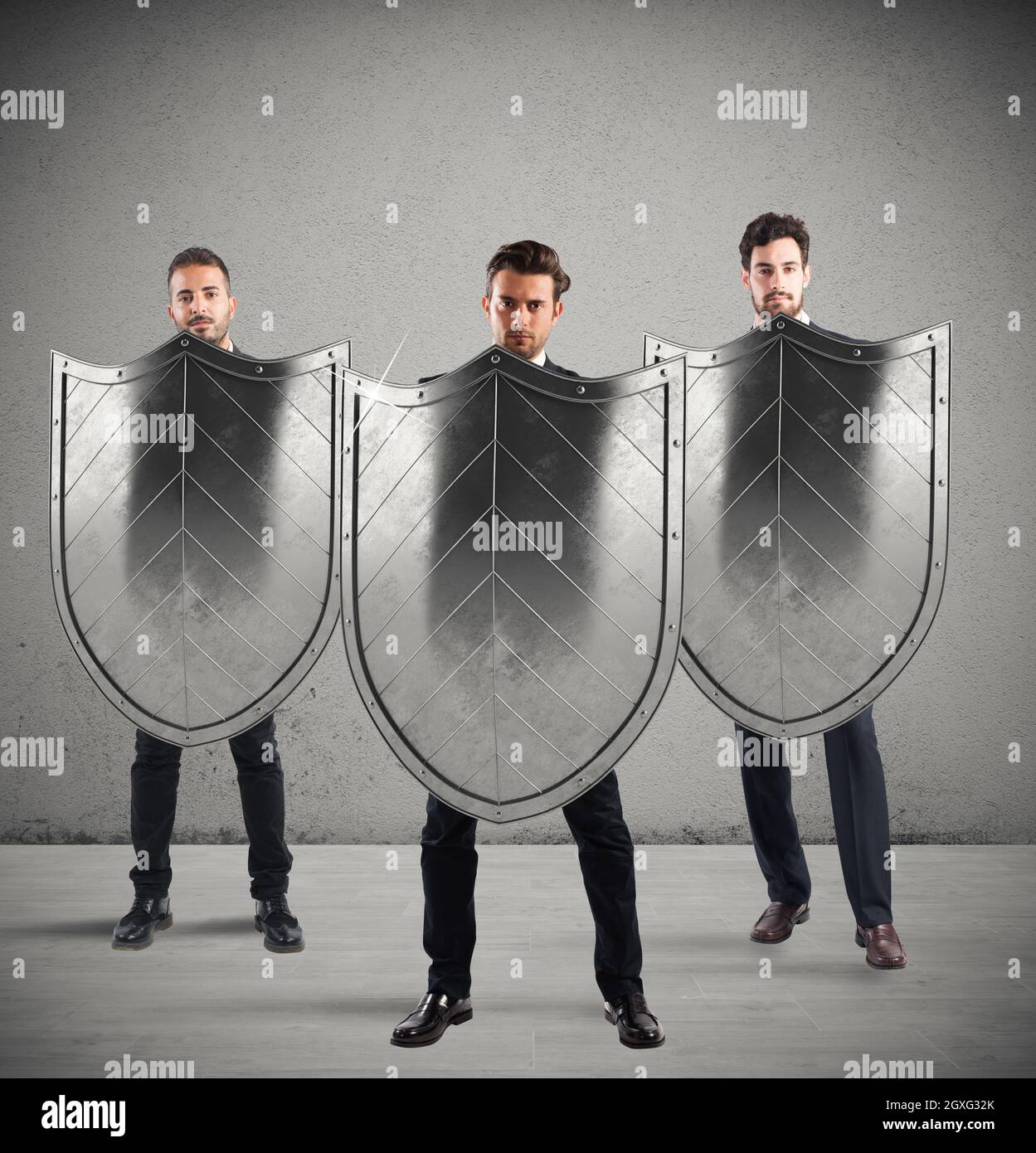 Businessmen with shields. concept of protection and defense in the ...