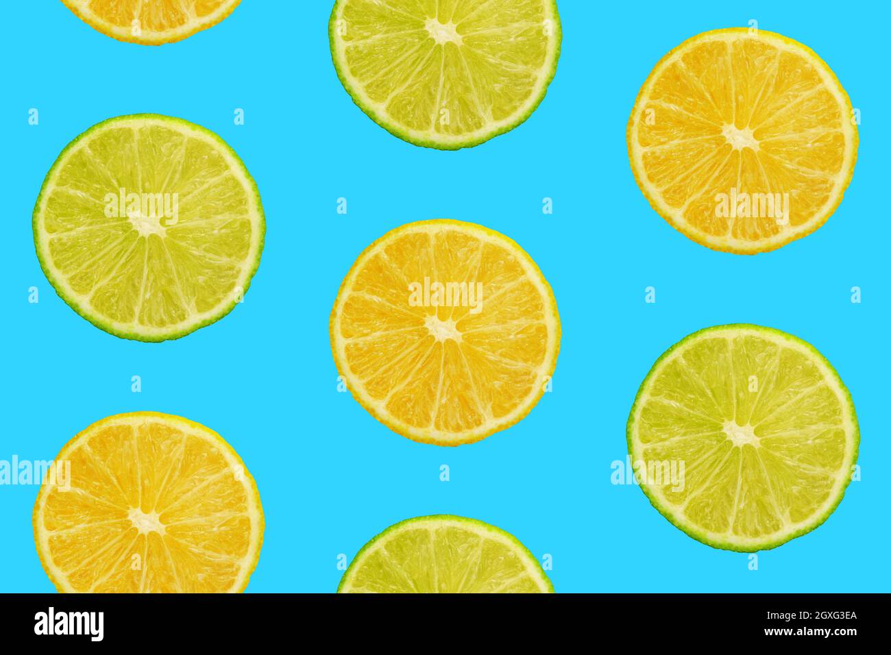 Seamless pattern of fresh ripe orange and lime round cut wedges on ...