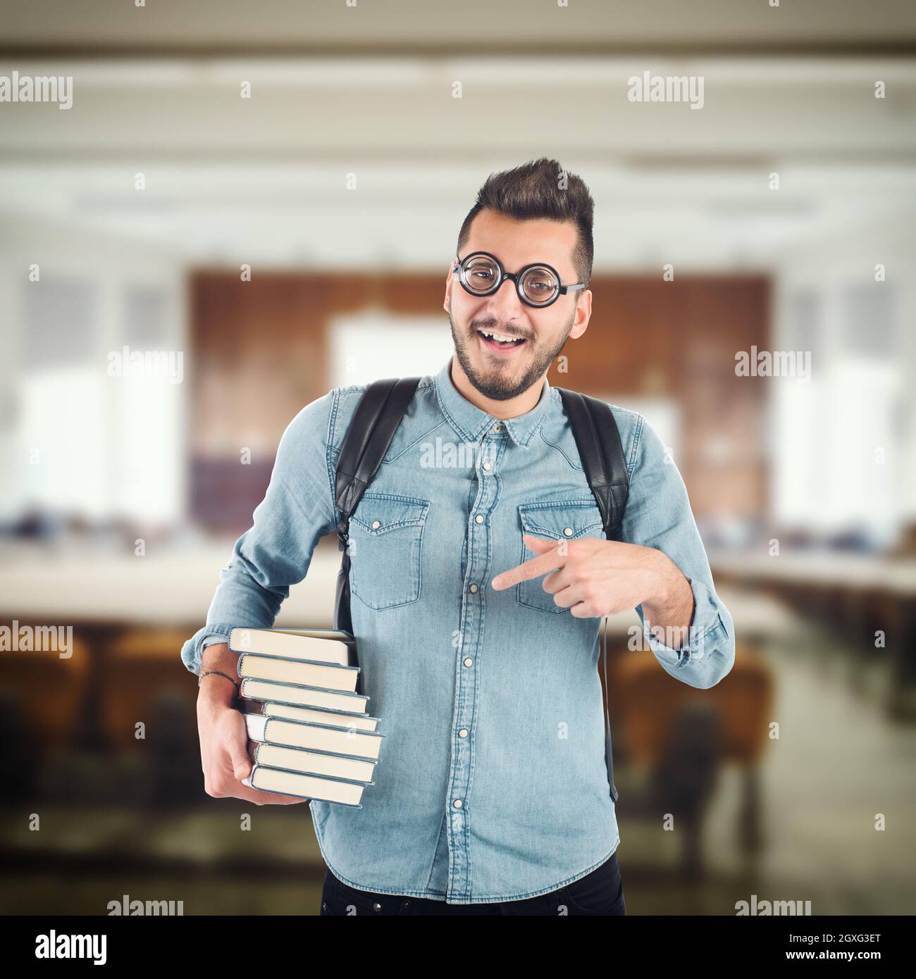 Boy nerd studying books for an exam Stock Photo - Alamy