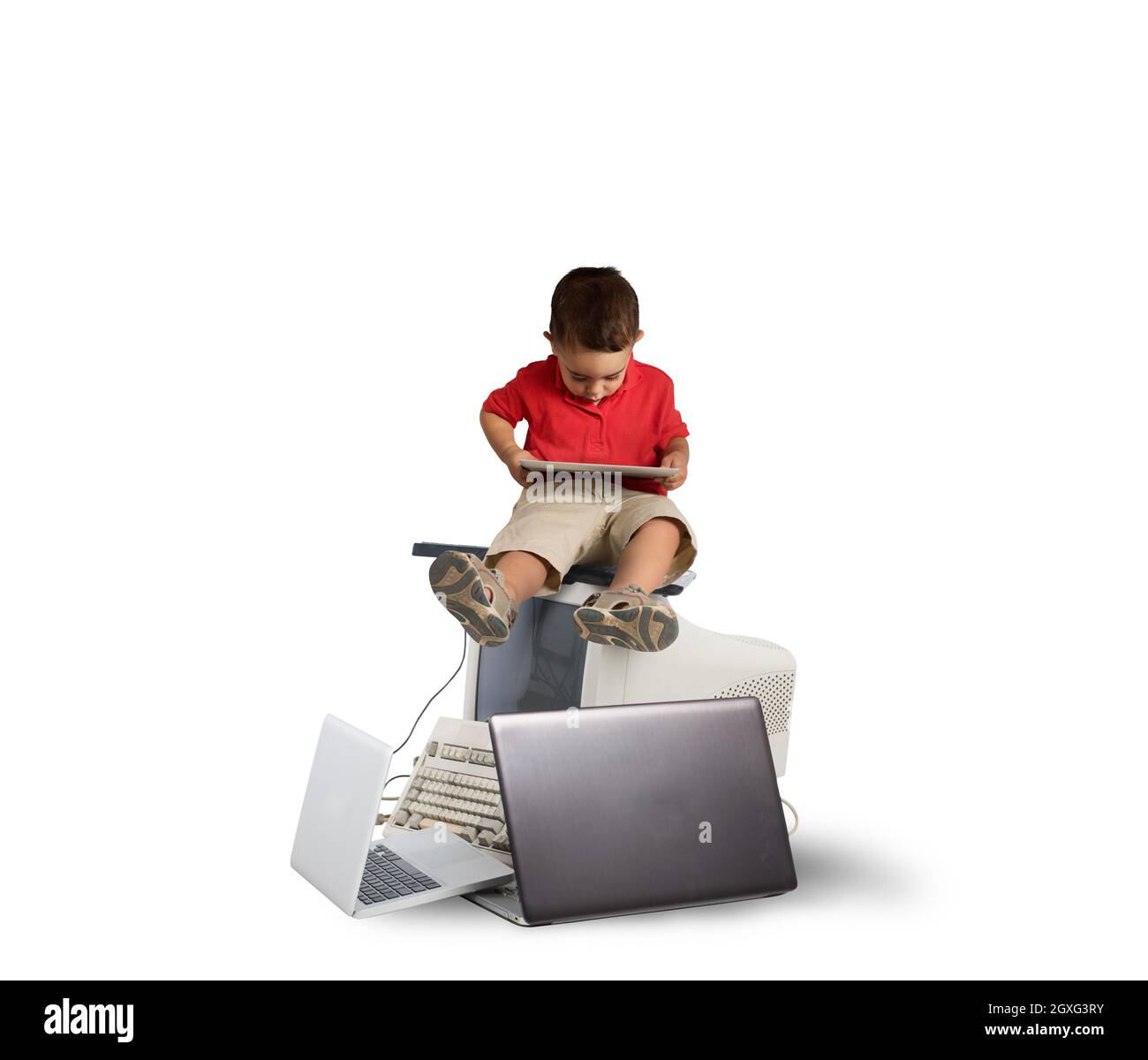 Child sitting on a pile of computers. Harmful technology for the growth ...
