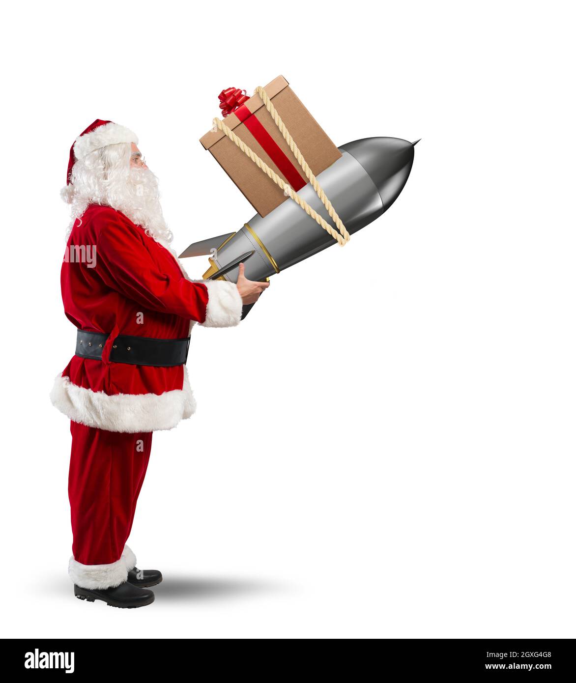 Santa Claus ready to to launch a rocket with Christmas gift box in the ...