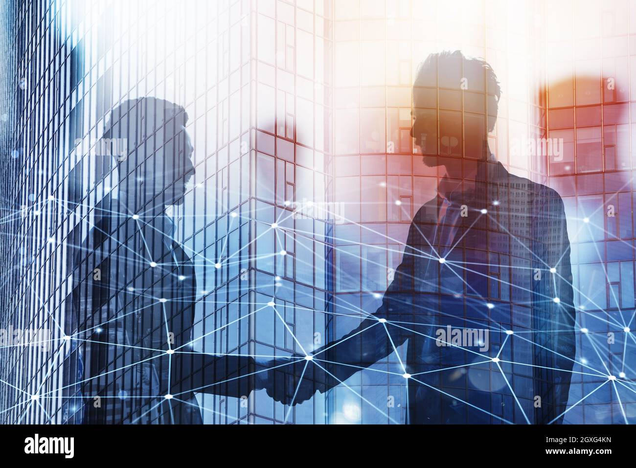 Handshaking business person in the office with network effect. concept ...