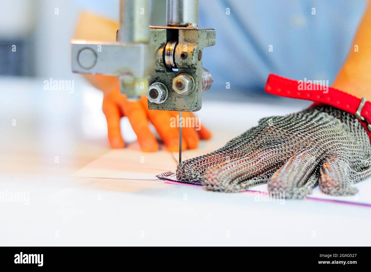 Woman cutting pattern for tailoring Stock Photo - Alamy