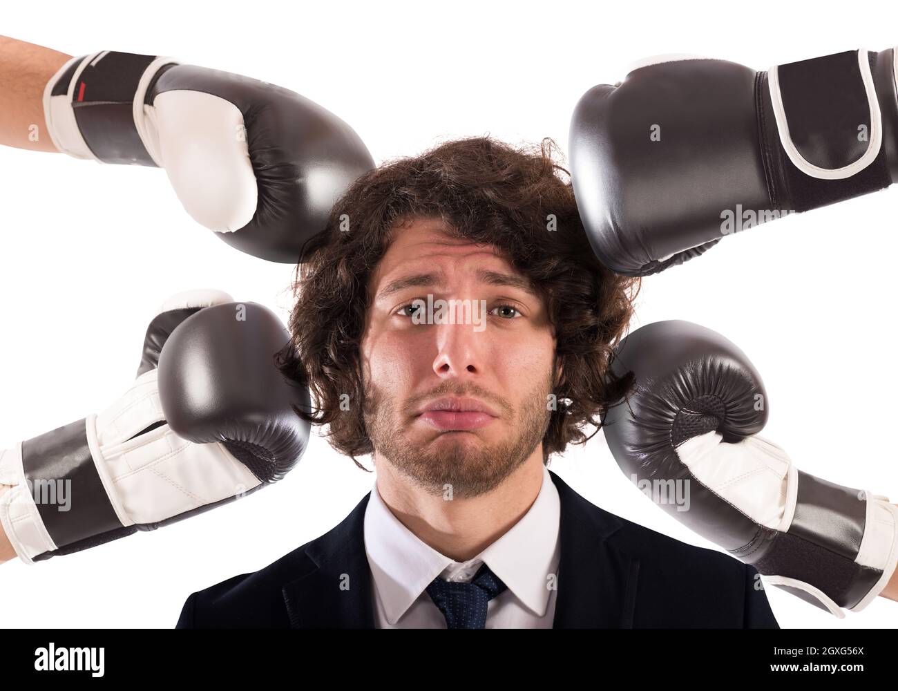Angry People hit with punches a sad businessman Stock Photo - Alamy