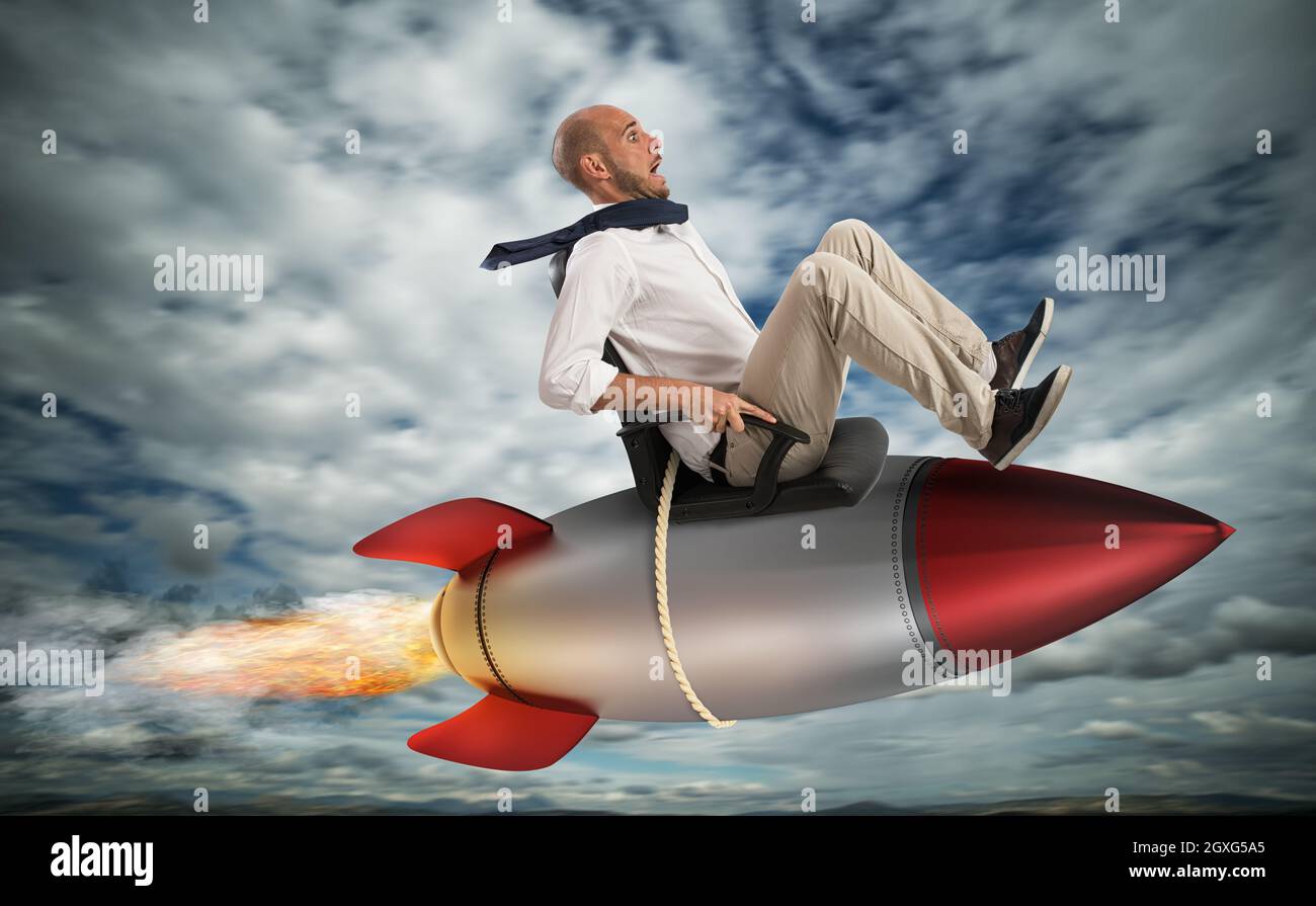 Businessman flying over a rocket in the sky. Increase the climb to ...