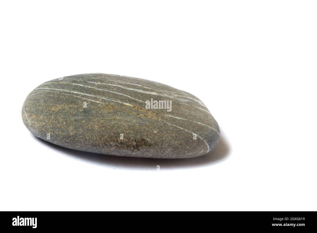 striped stone with shadow isolated on white background. sea pebbles ...