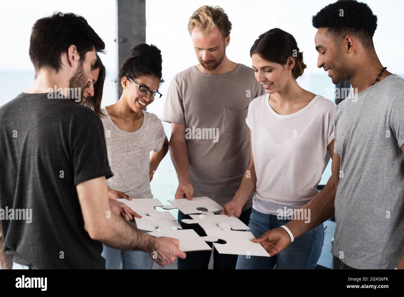 Team of businessmen work together for one goal with puzzles. Concept of ...