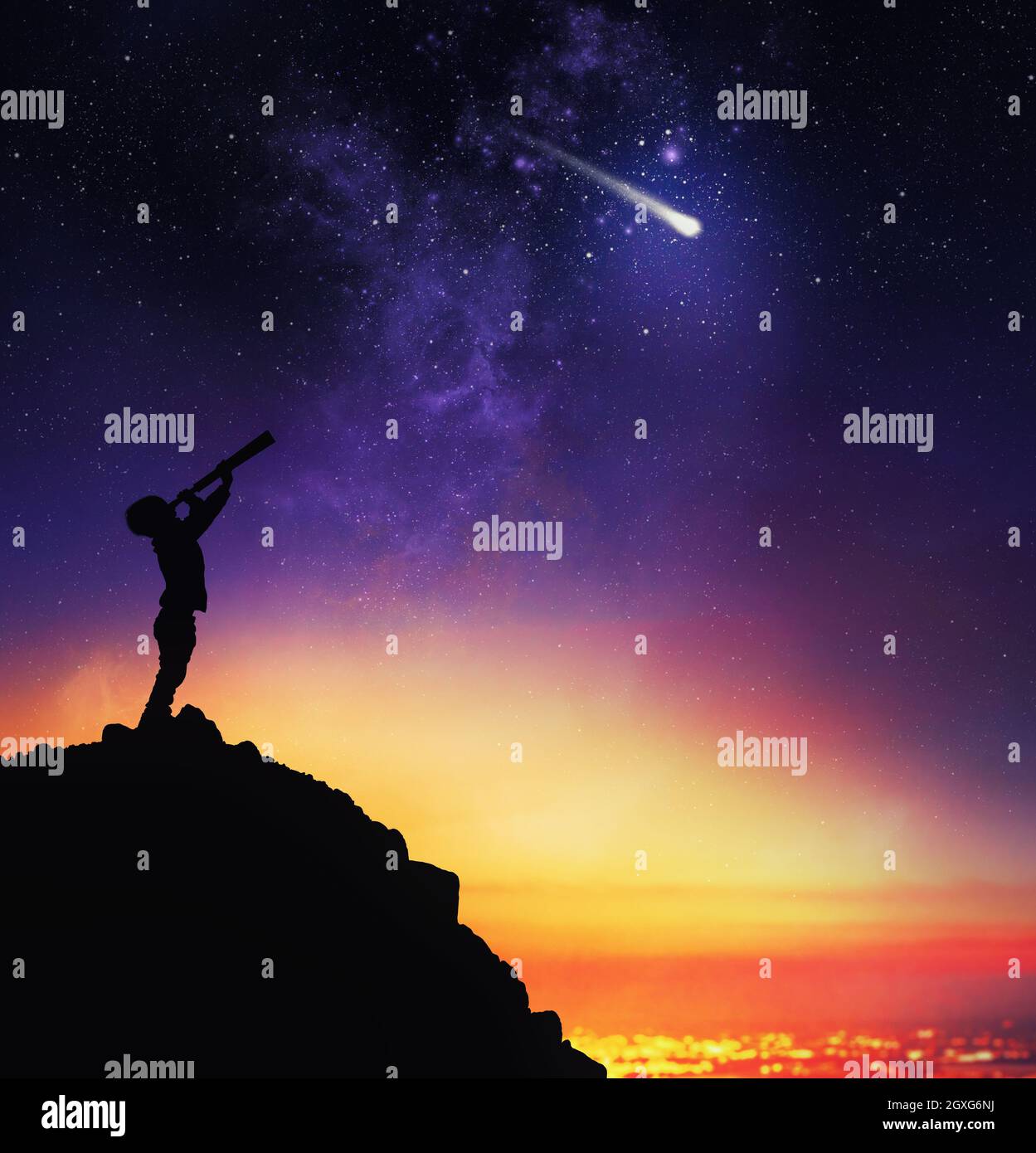 Backlit figure of a child from above a mountain expresses a desire ...