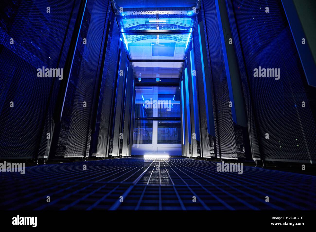 Modern interior of mainframe with blue neon Stock Photo - Alamy