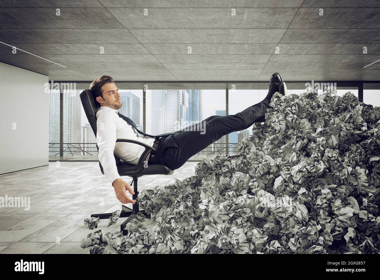 Man buried in paperwork hi-res stock photography and images - Alamy