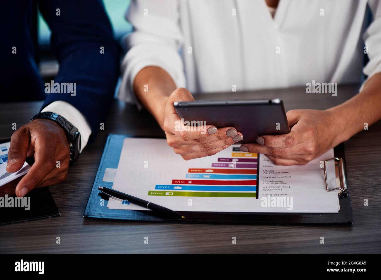 Team of people work together on company statistics in office. concept ...