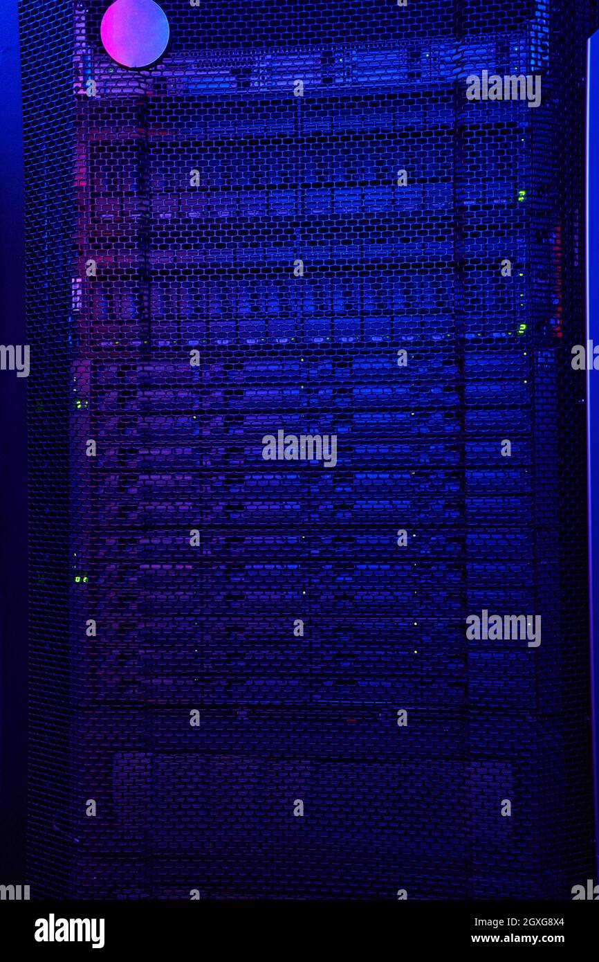 Picture of storage server with many HDD disks inside rack in tech place ...