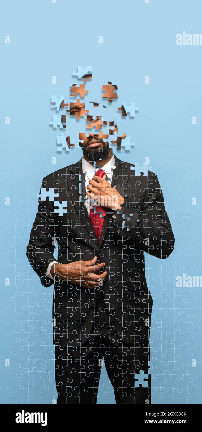 Creative portrait of african male businessman in black suit with ...