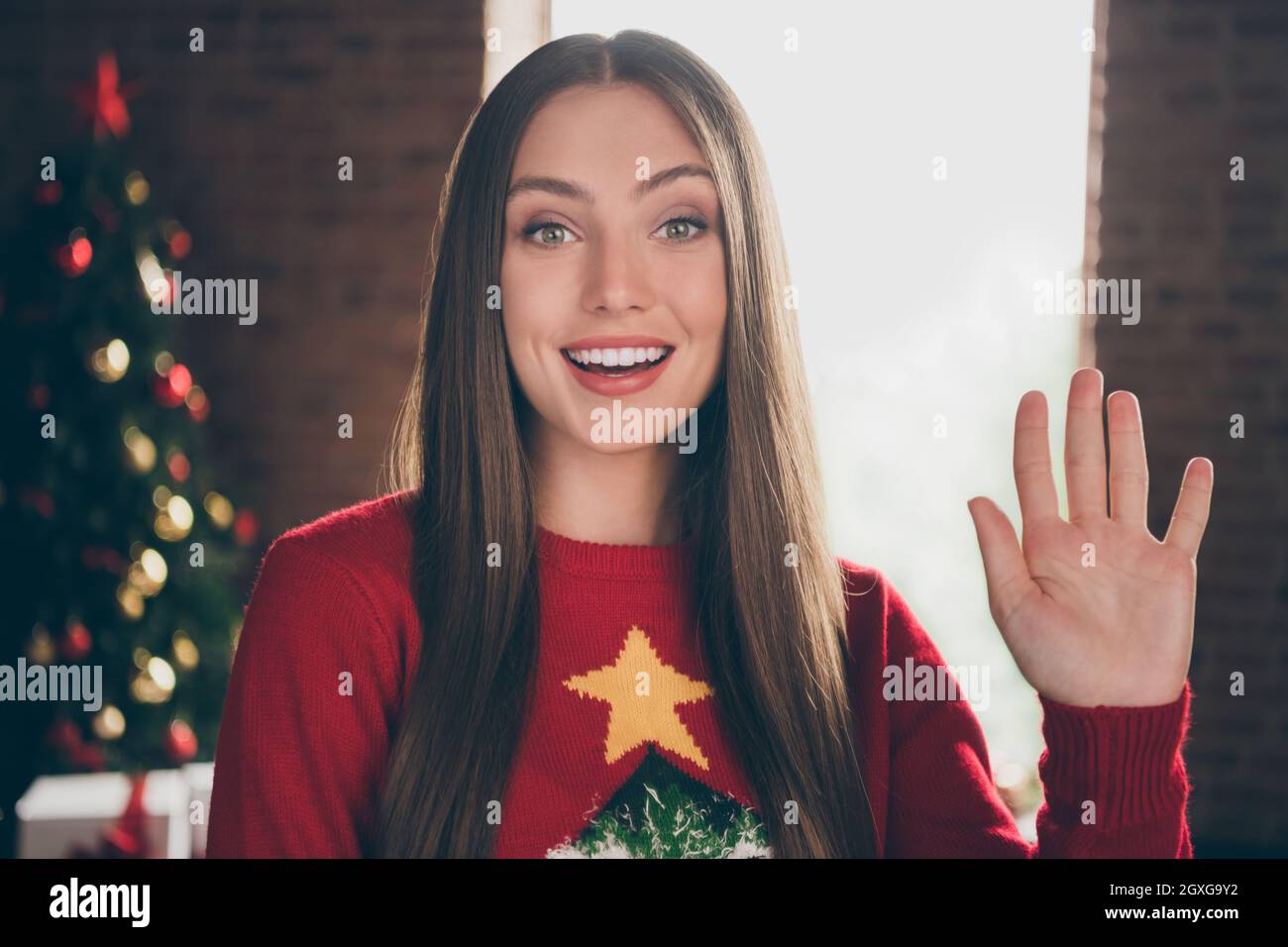 Portrait of attractive cheerful long-haired girl waving hi web cam zoom ...