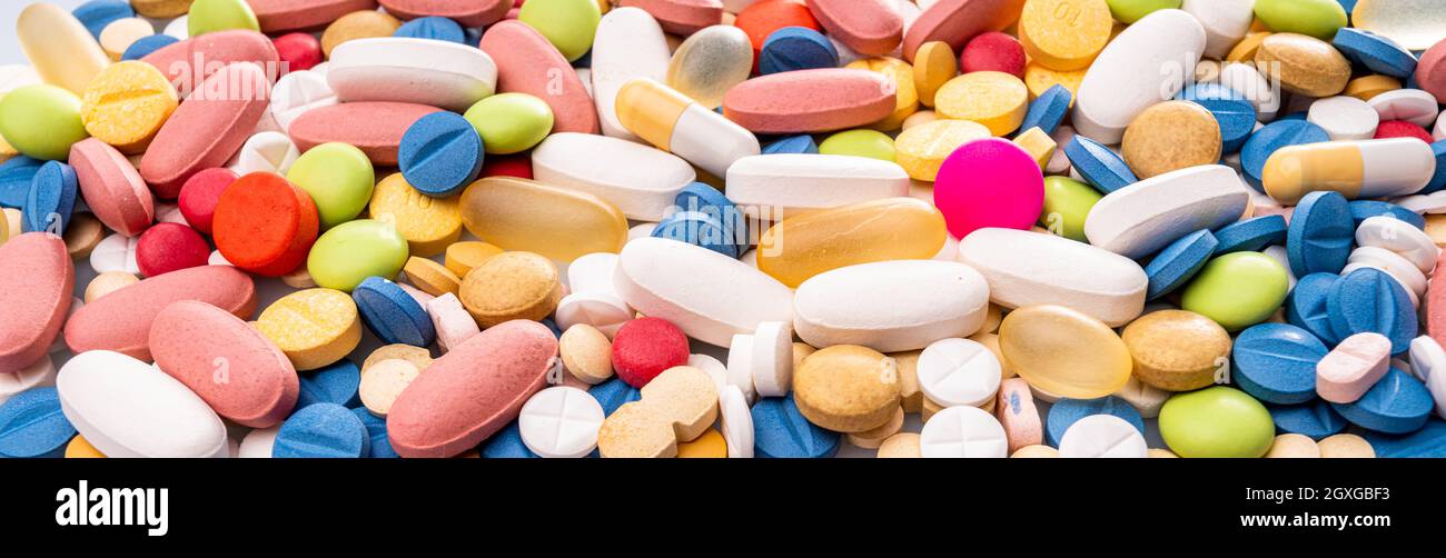 Close up of variety of colorful pills, capsules, and tablets Stock ...