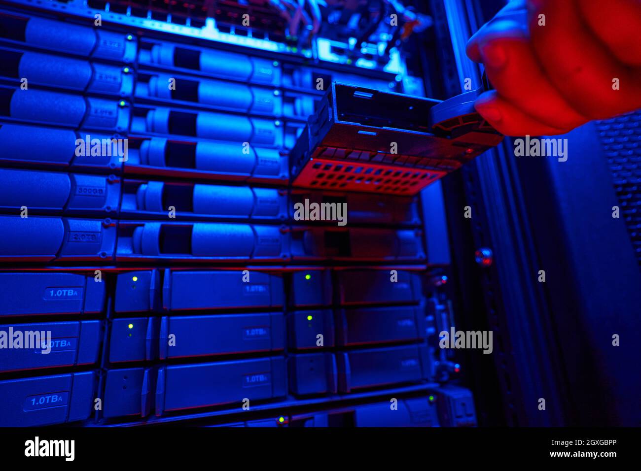 Engineer working with server racks hi-res stock photography and images ...