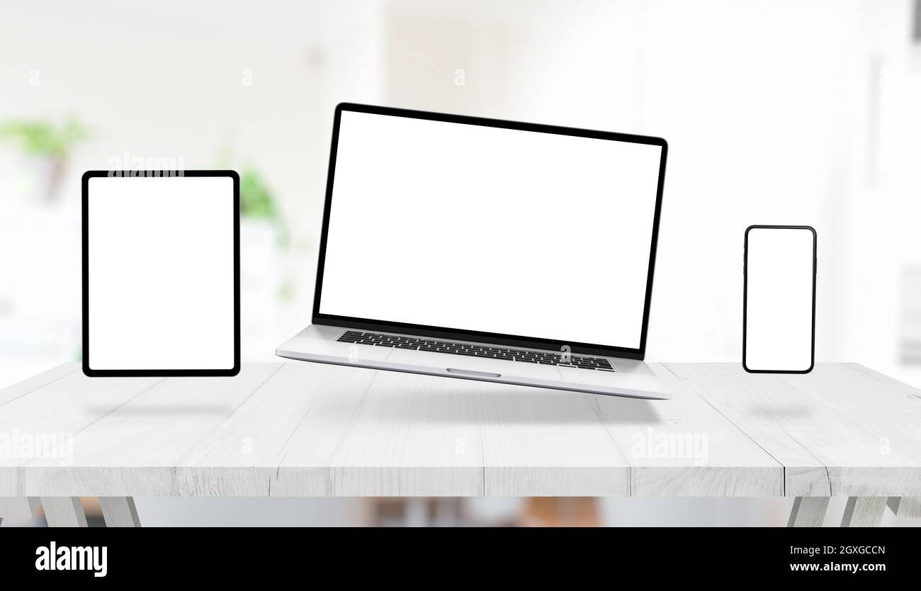 Laptop, tablet and phone with isolated display for mockup, levitating ...