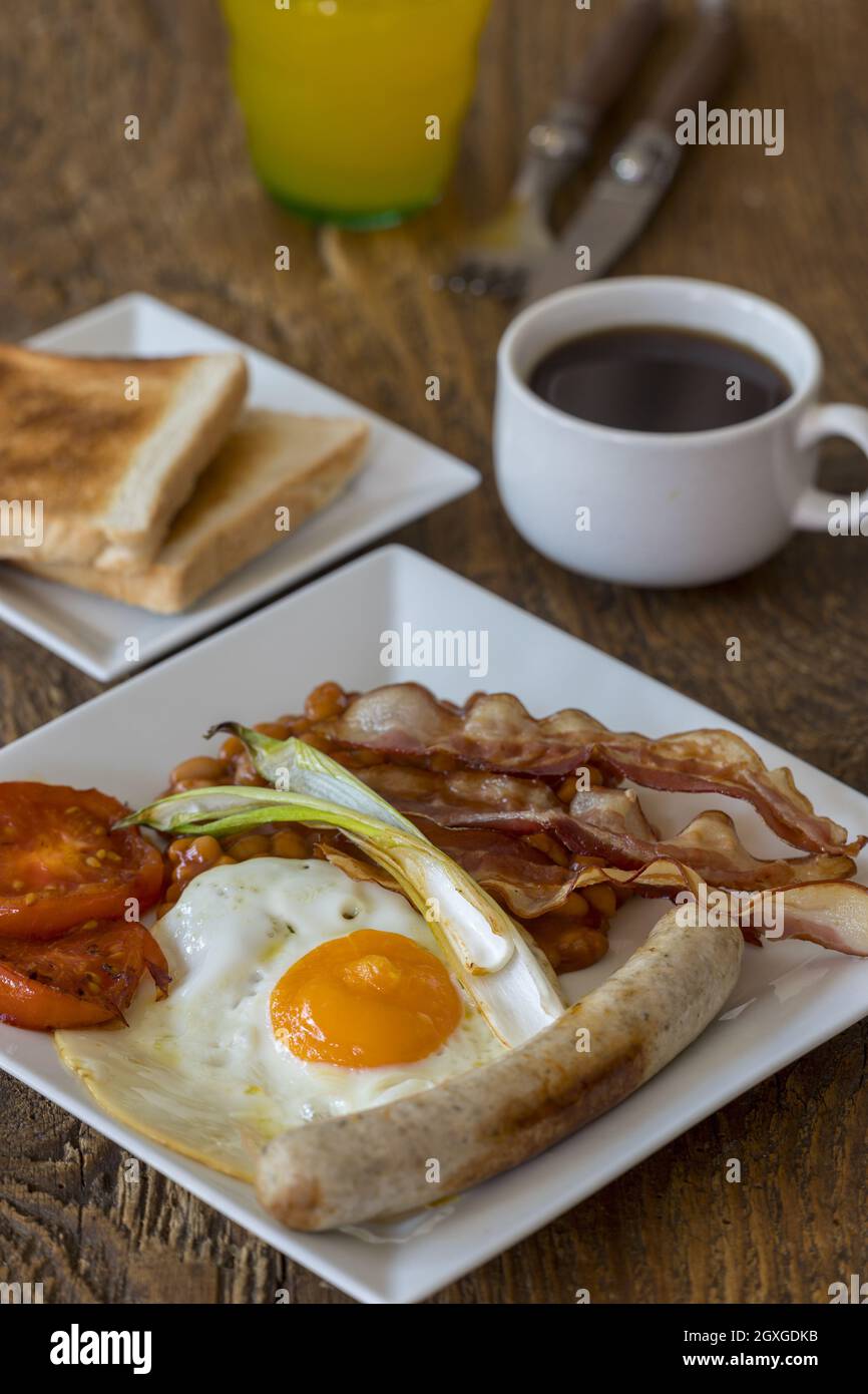 english breakfast on wood with coffee Stock Photo - Alamy