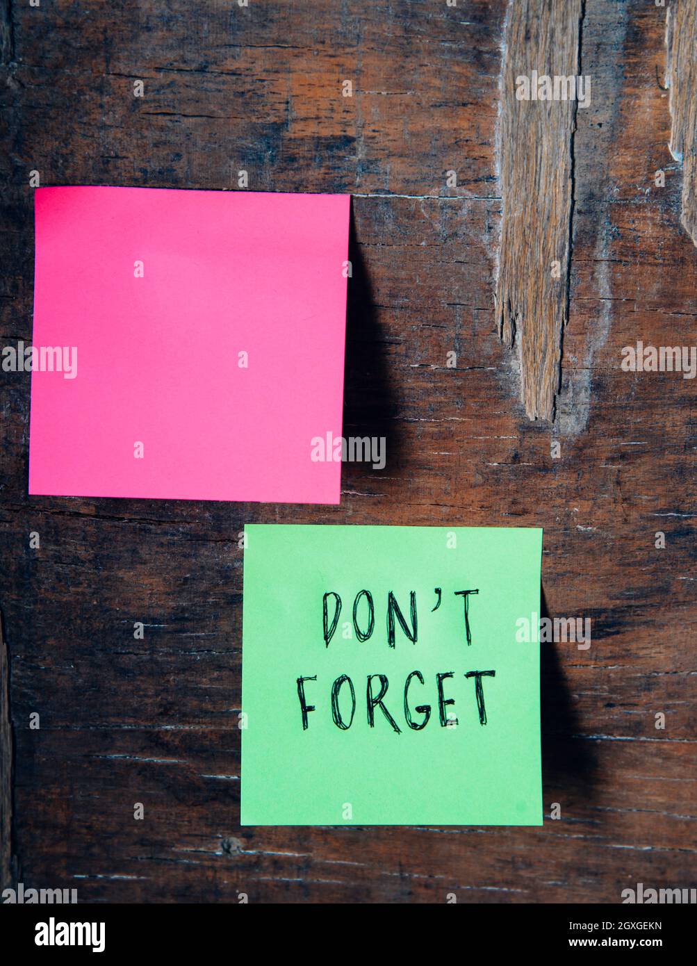 Don't forget written sticker on pineboard. Colorful sticky notes on ...
