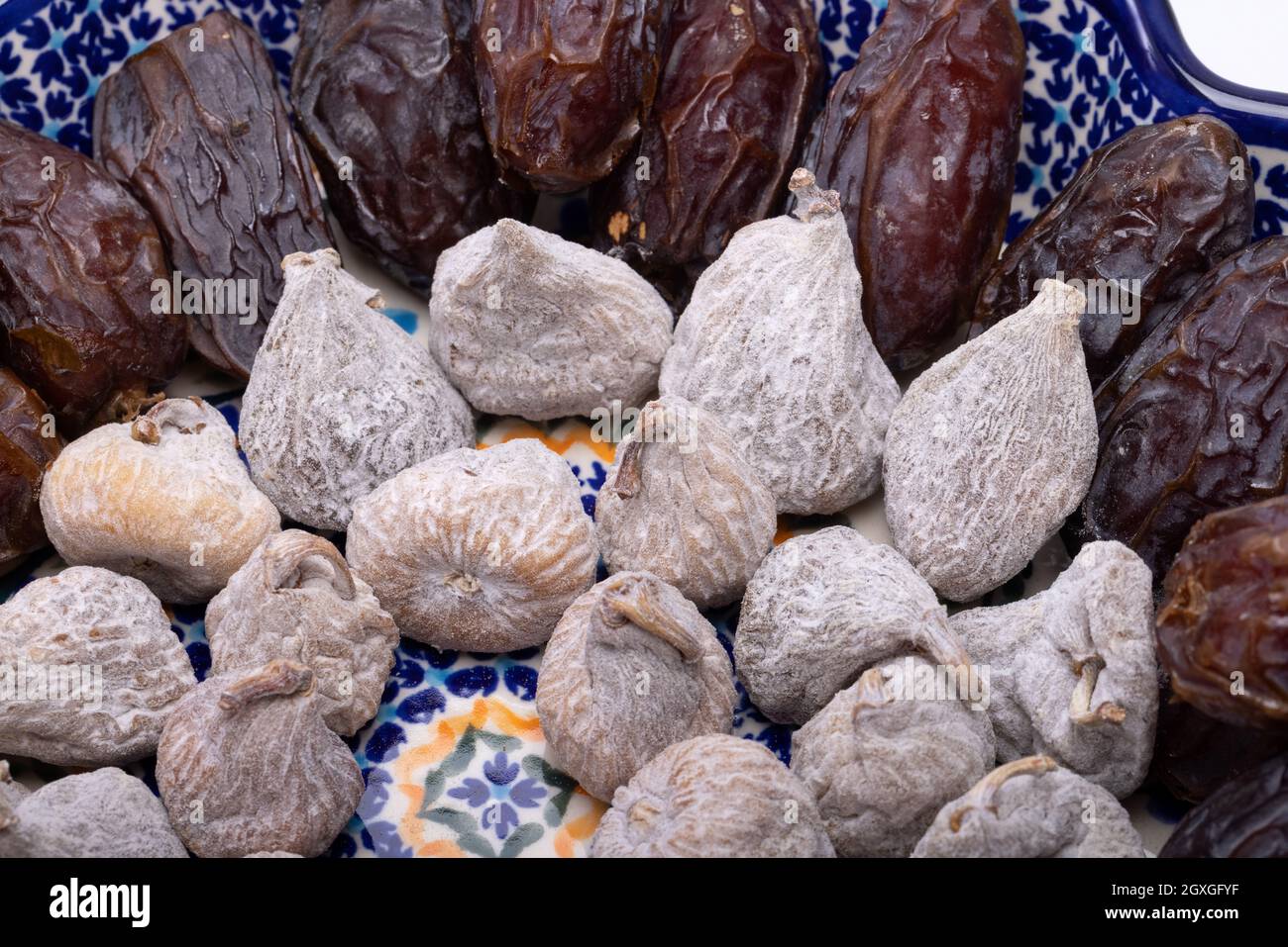 dried figs sprinkled with rice flour and medjoul jumbo dates Stock ...