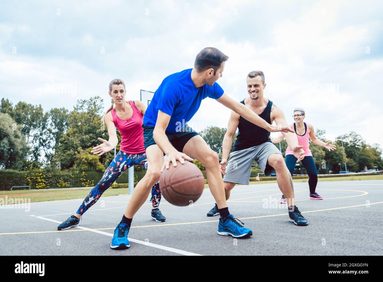 Basketball dribbling women hi-res stock photography and images - Alamy