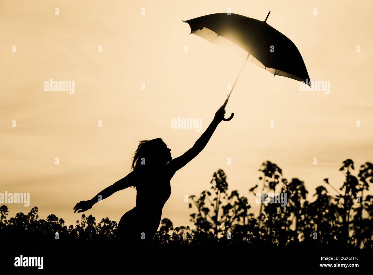 Nature girl at windy rainy day has adventure wanderlust. Wonderful ...
