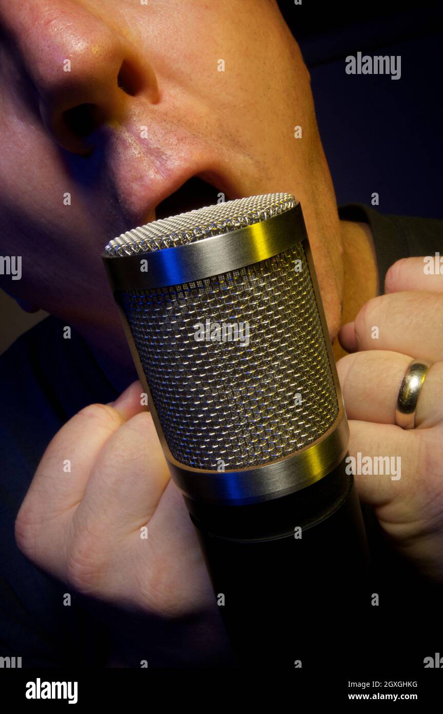 Passionate Vocalist & Microphone Stock Photo - Alamy