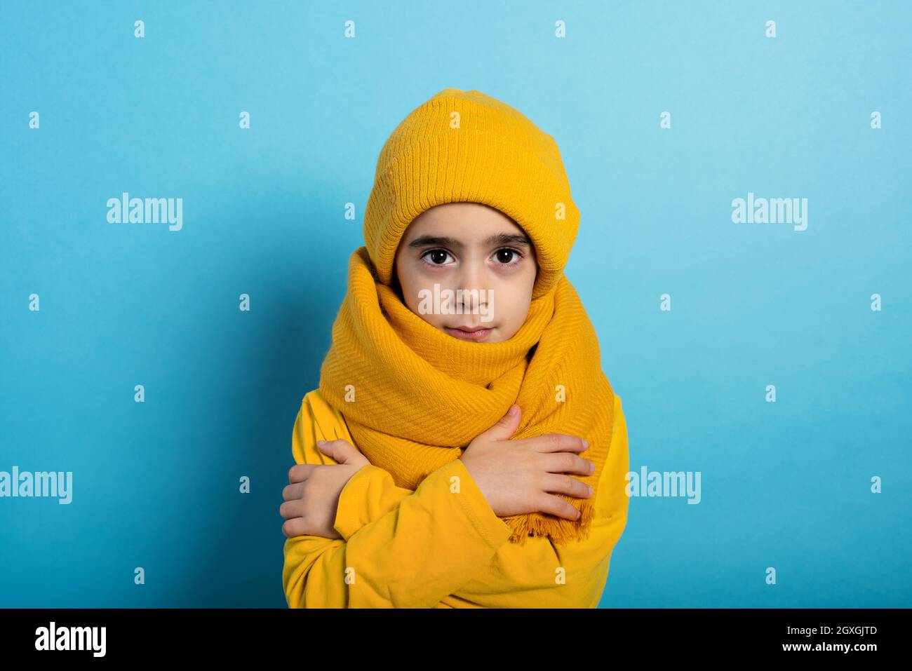 Child covers herself to avoid catching a cold Stock Photo - Alamy