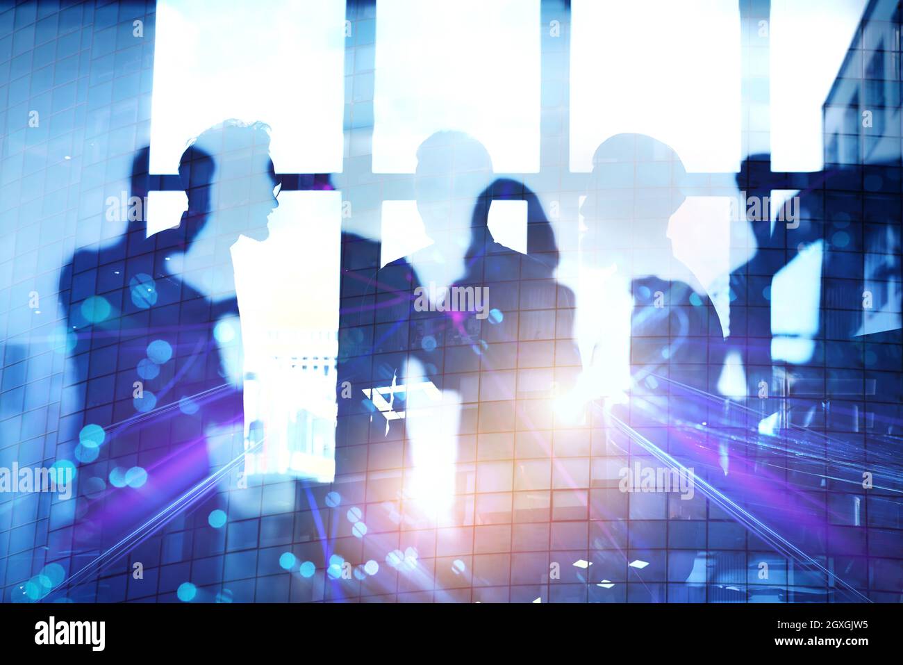 Business people collaborate together in a modern office. Internet ...