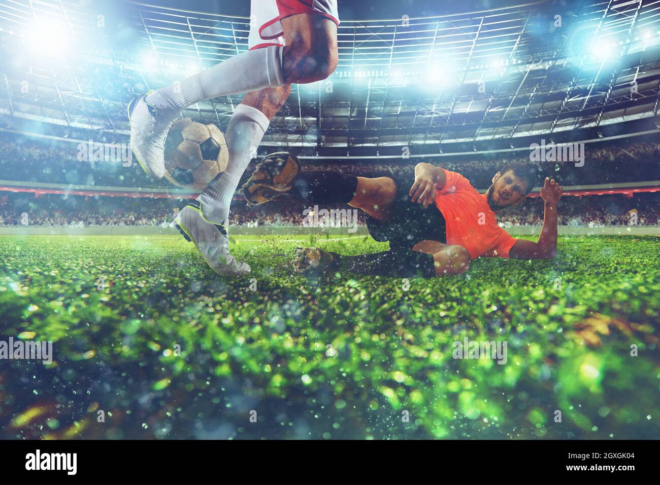 Two soccer players chase the ball at the stadium Stock Photo - Alamy