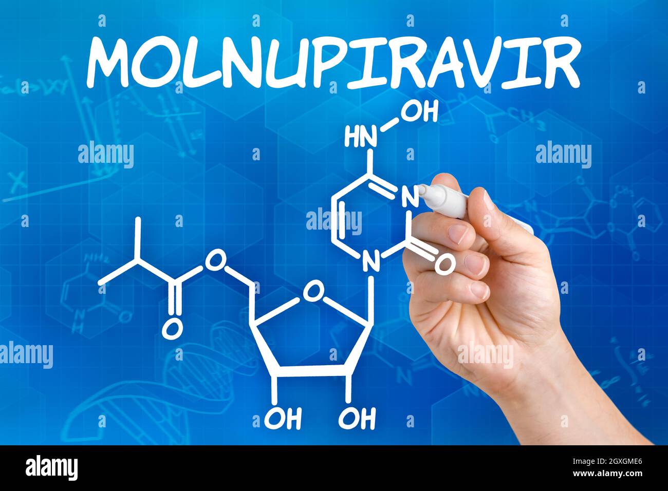 Hand with pen drawing the chemical formula of Molnupiravir Stock Photo ...