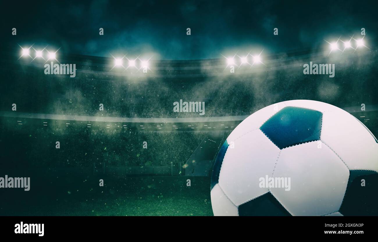 Football scene at night match with the ball at the centre of stadium ...